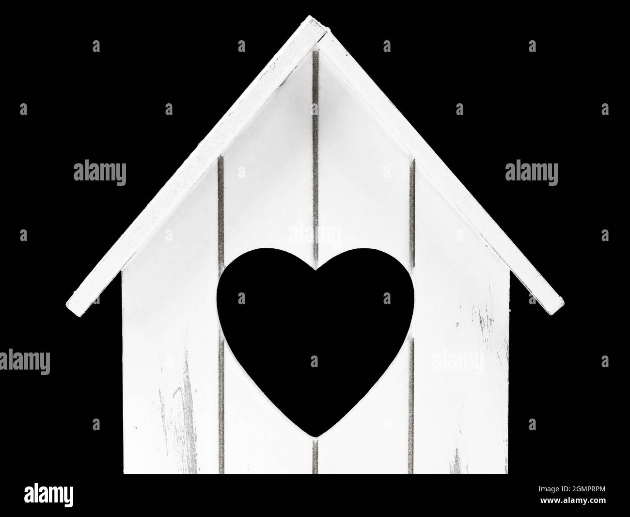 front view of miniatur wooden house with heart shape inside isolated on ...