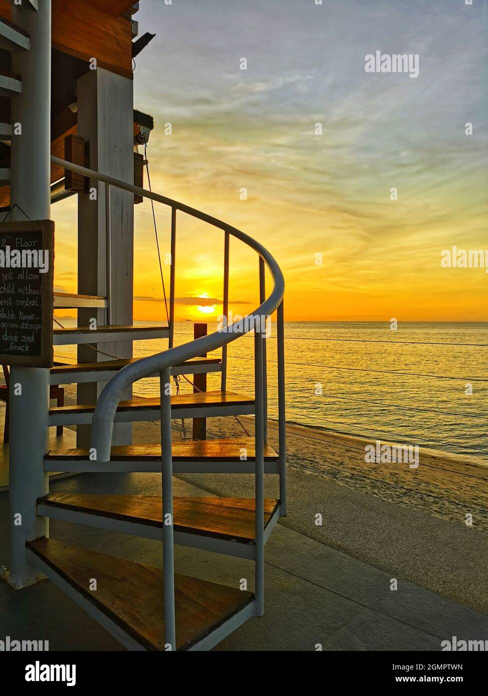 Vertical shot of stairs at the beach during a beautiful sunset Stock ...