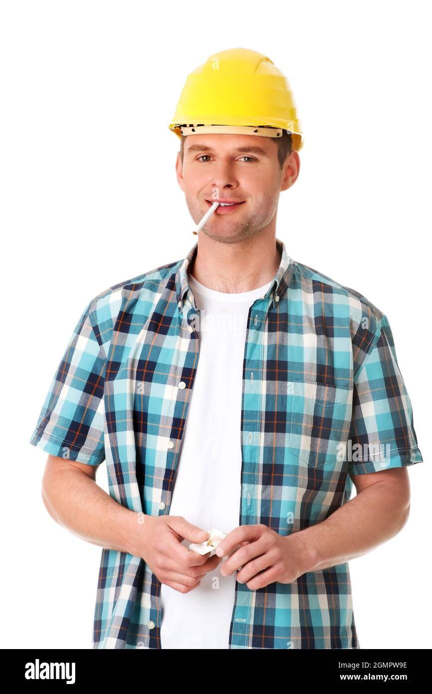Young repairman smoking a cigarette Stock Photo - Alamy