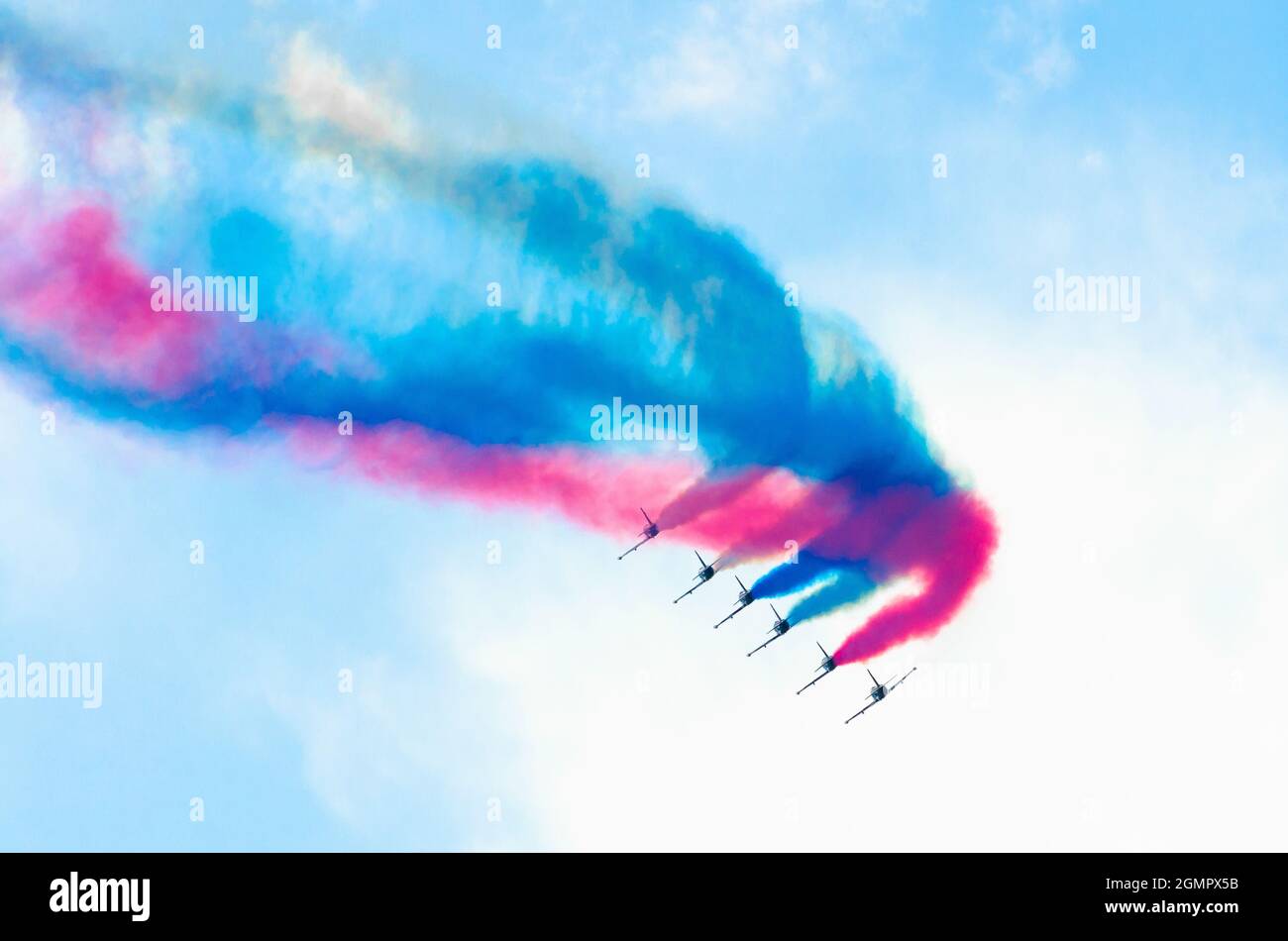 Airplane group fighter against the background of color smoke Stock ...