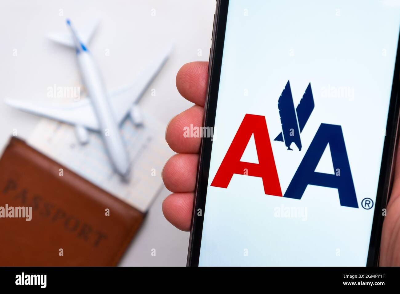 American Airlines logo on the screen of smartphone on the background of ...