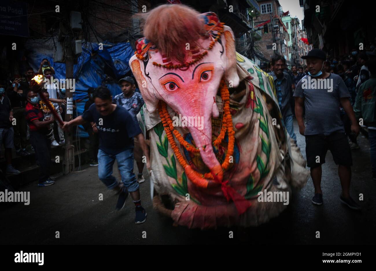 Kathmandu, Bagmati, Nepal. 20th Sep, 2021. An elephant-masked performer ...