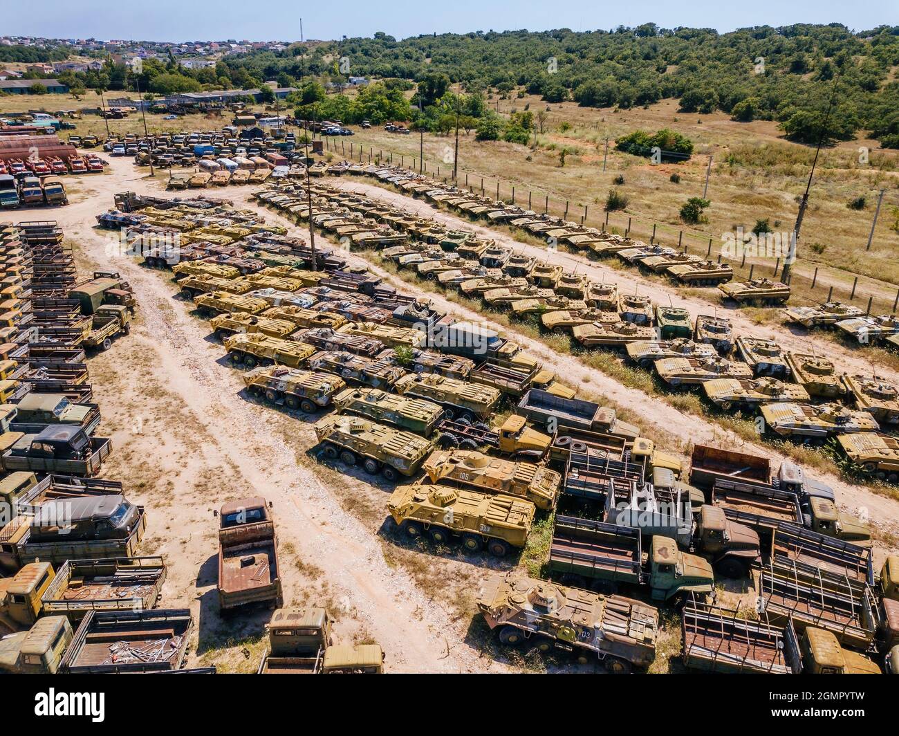 Old rusty broken Russian military vehicles in industrial area, aerial view Stock Photo - Alamy