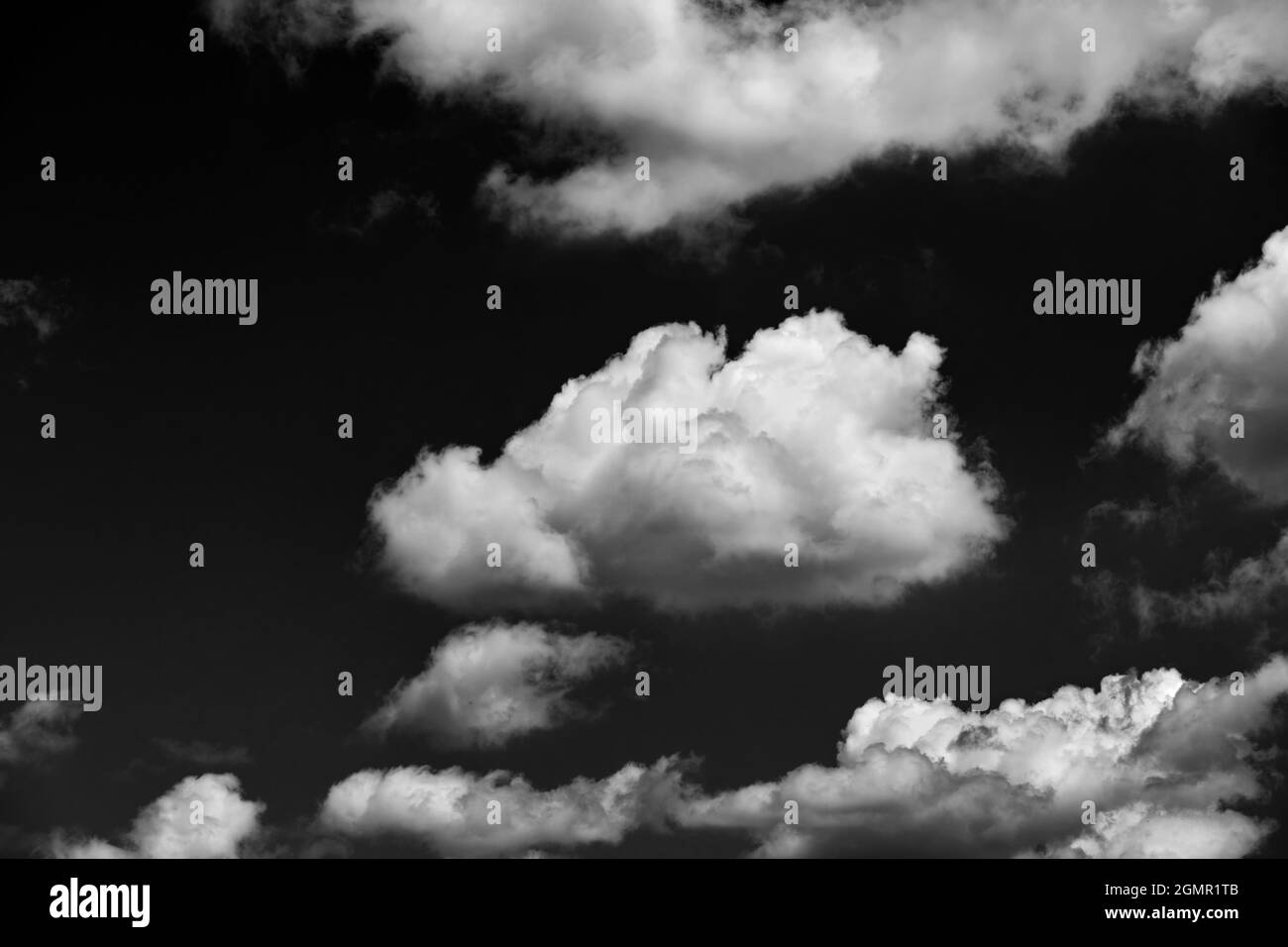 Blue sky puffy cumulus Black and White Stock Photos & Images - Alamy