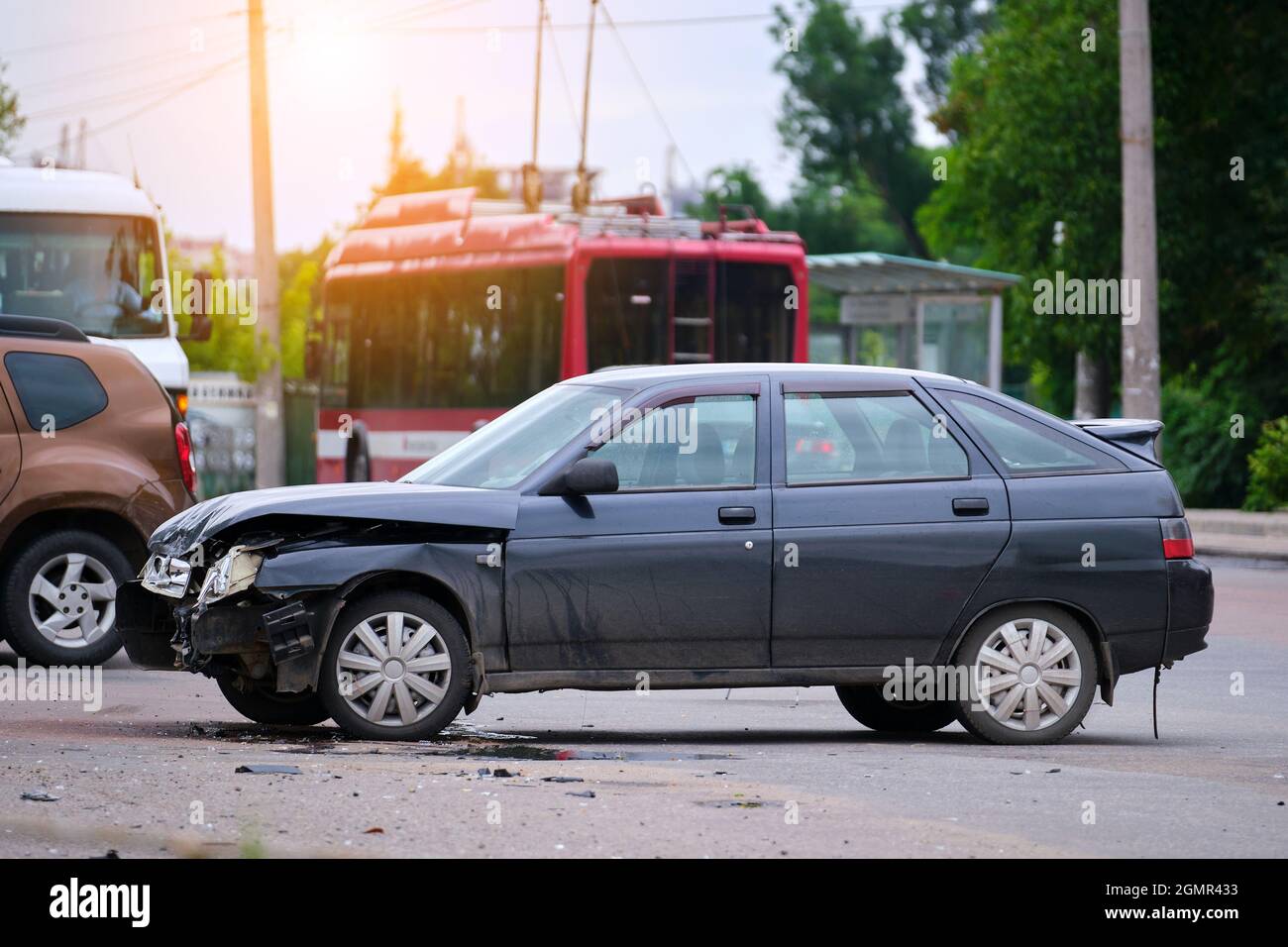 Damaged in car accident vehicle on city street crash site Stock Photo ...