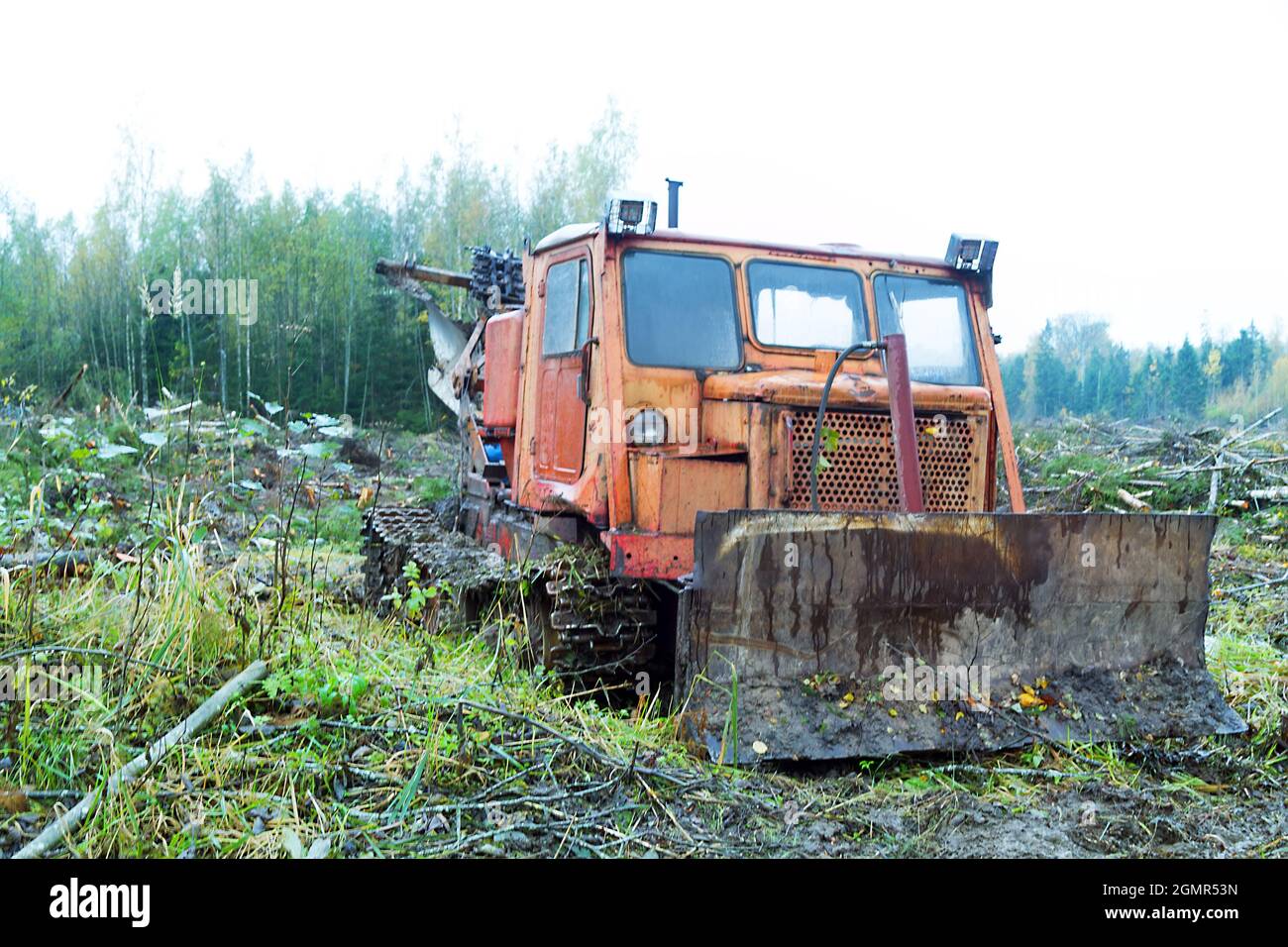 Forestry. Trenching plough, plow ditcher (backhoe; diker) works in the ...