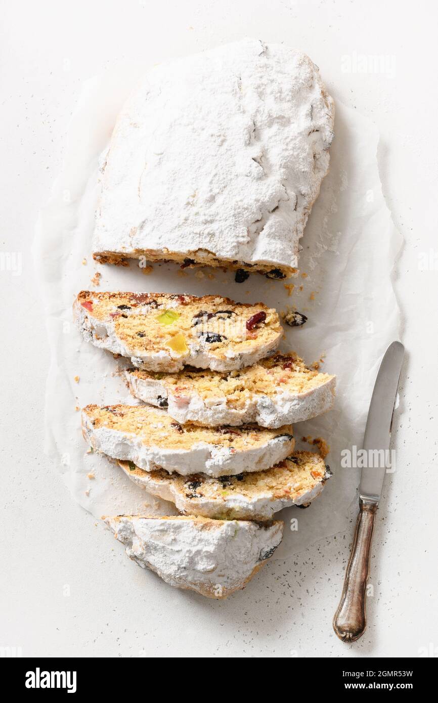 Christmas stollen - German bread on a white background. View from above ...