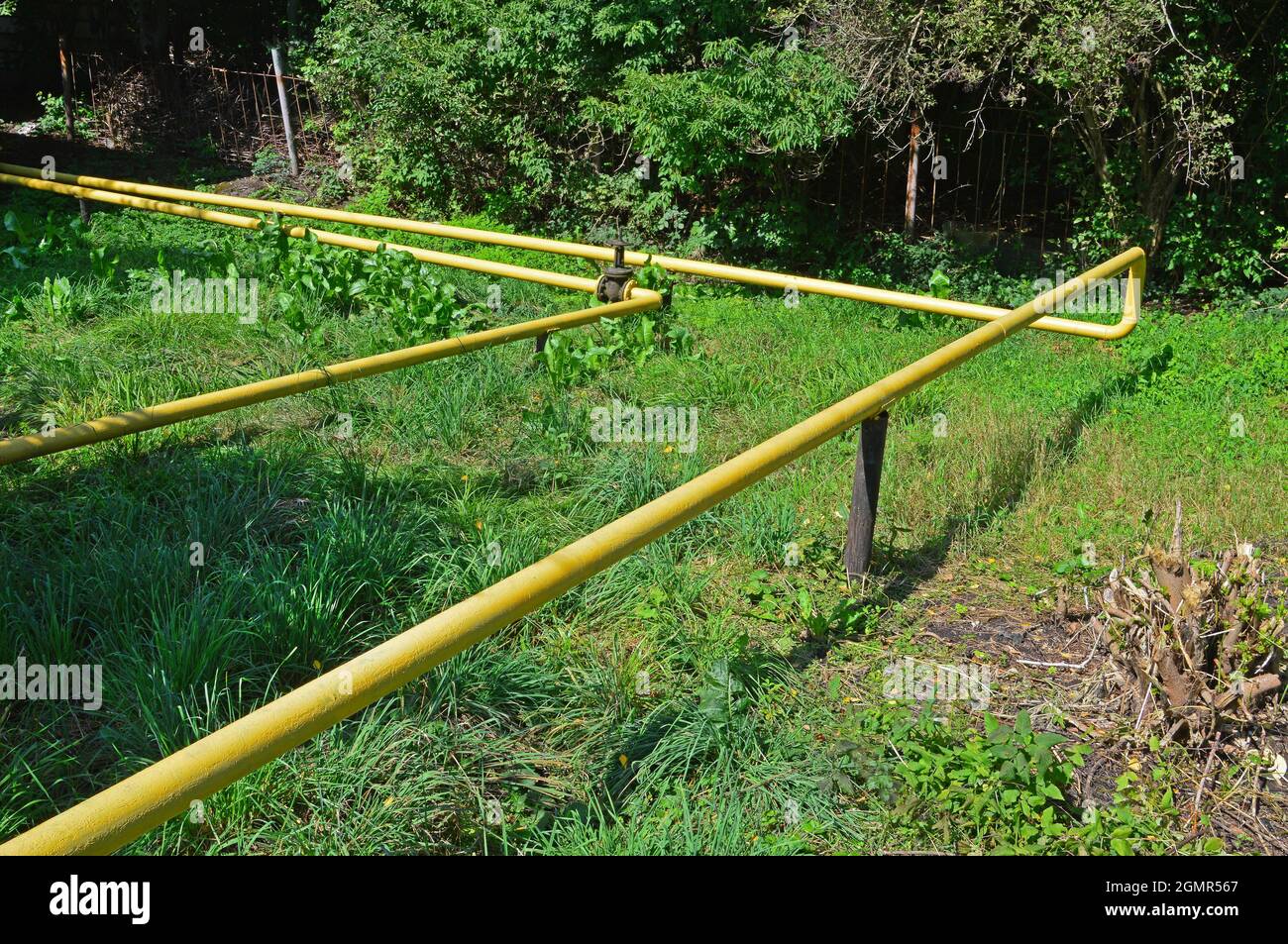 Two pipes come out of the gas distribution point Stock Photo - Alamy