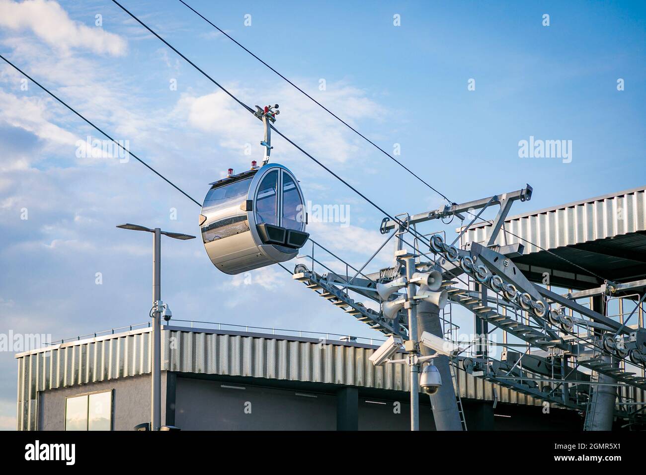 City cable car with panoramic views of the city. Modern cab with cable ...