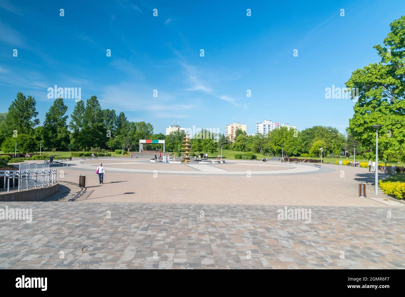 Pila, Poland - May 31, 2021: A square with a fountain in the Park on ...