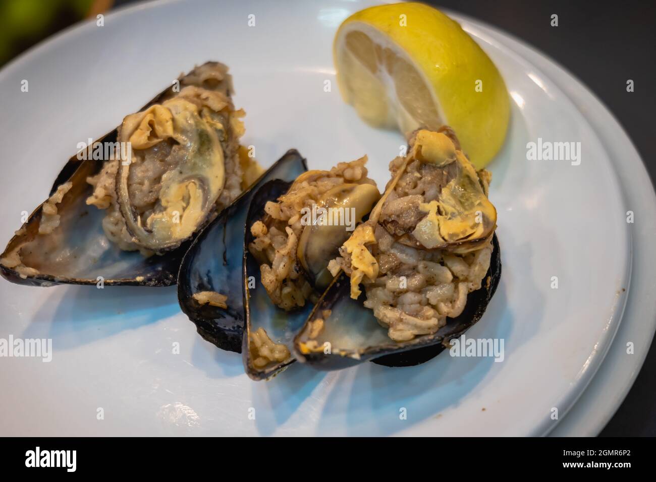 Midye dolma, stuffed mussels close-up, traditional Turkish food food ...
