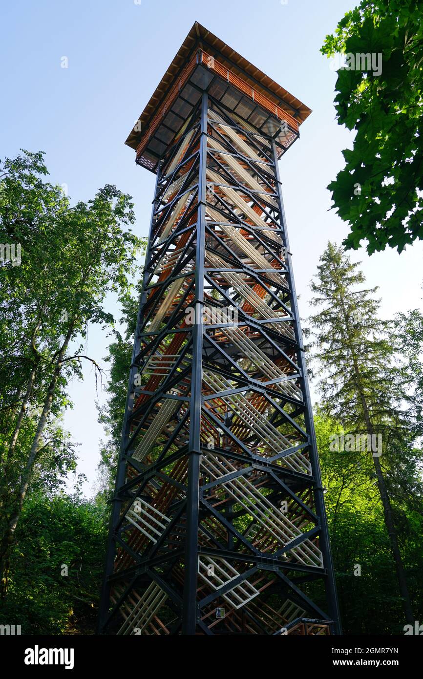 high new modern metal observation tower with decorative wooden elements ...