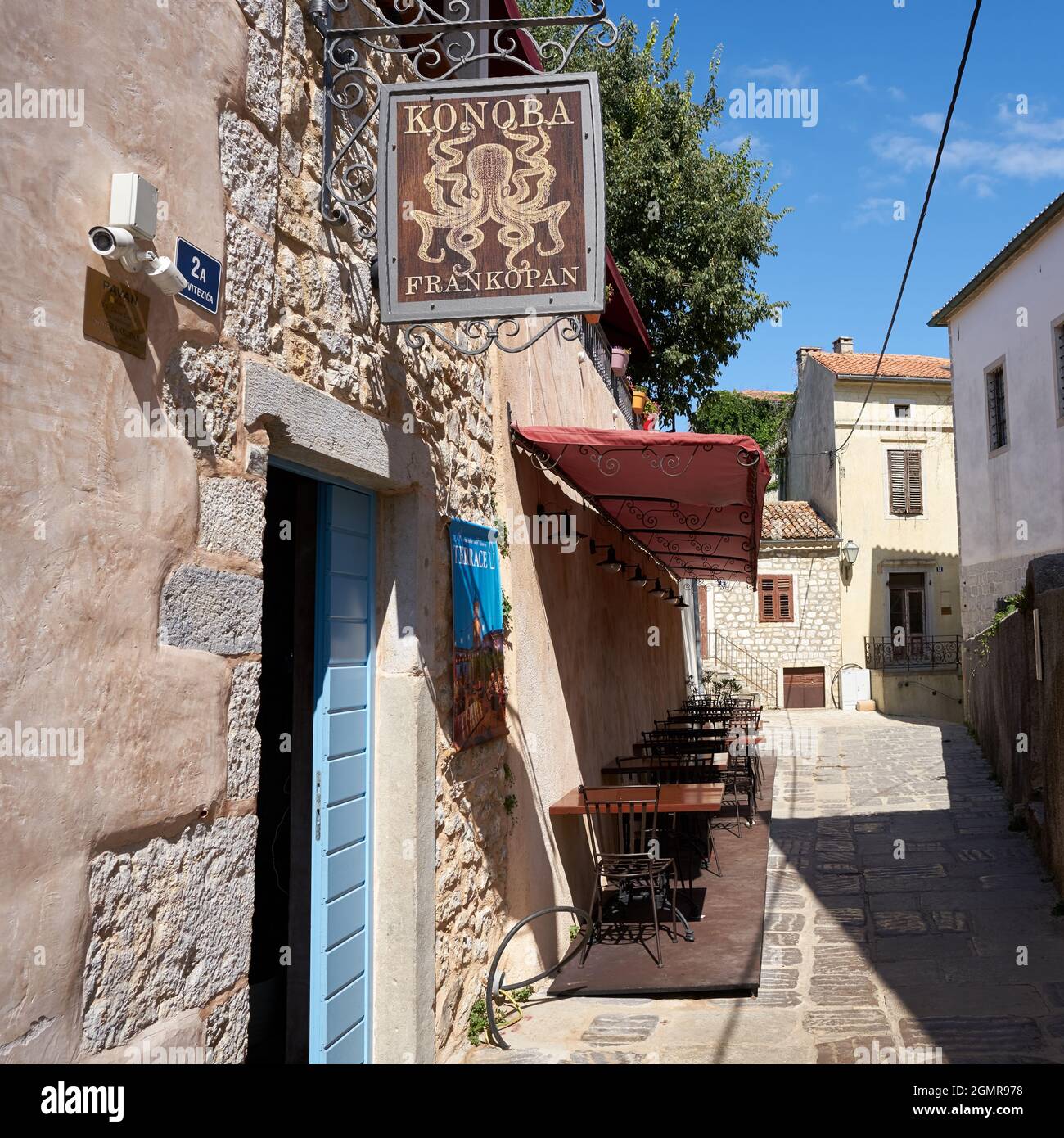Konoba in the old town of Krk in Croatia. A konoba is a small ...