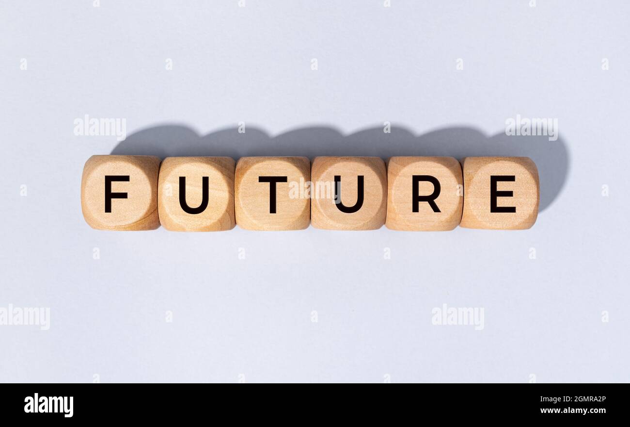 Future word on wooden block isolated on gray background Stock Photo - Alamy