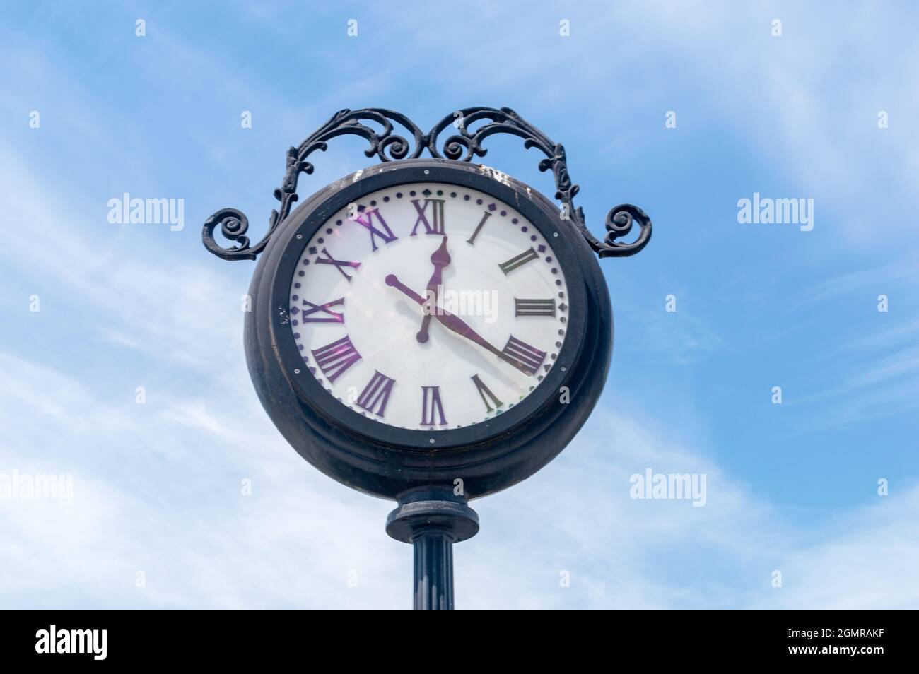 Large exterior clock on clue sky. Street vintage retro clock Stock ...