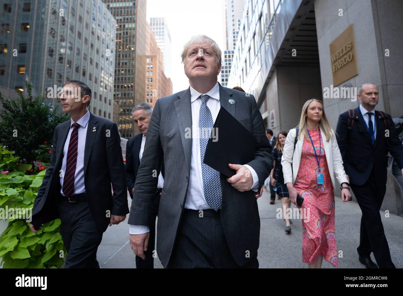 Prime Minister Boris Johnson walks to a television interview in New ...