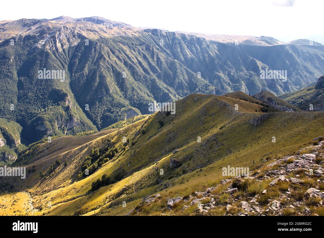 High angle shot of mountainous landscape with layers of peaks seen ...