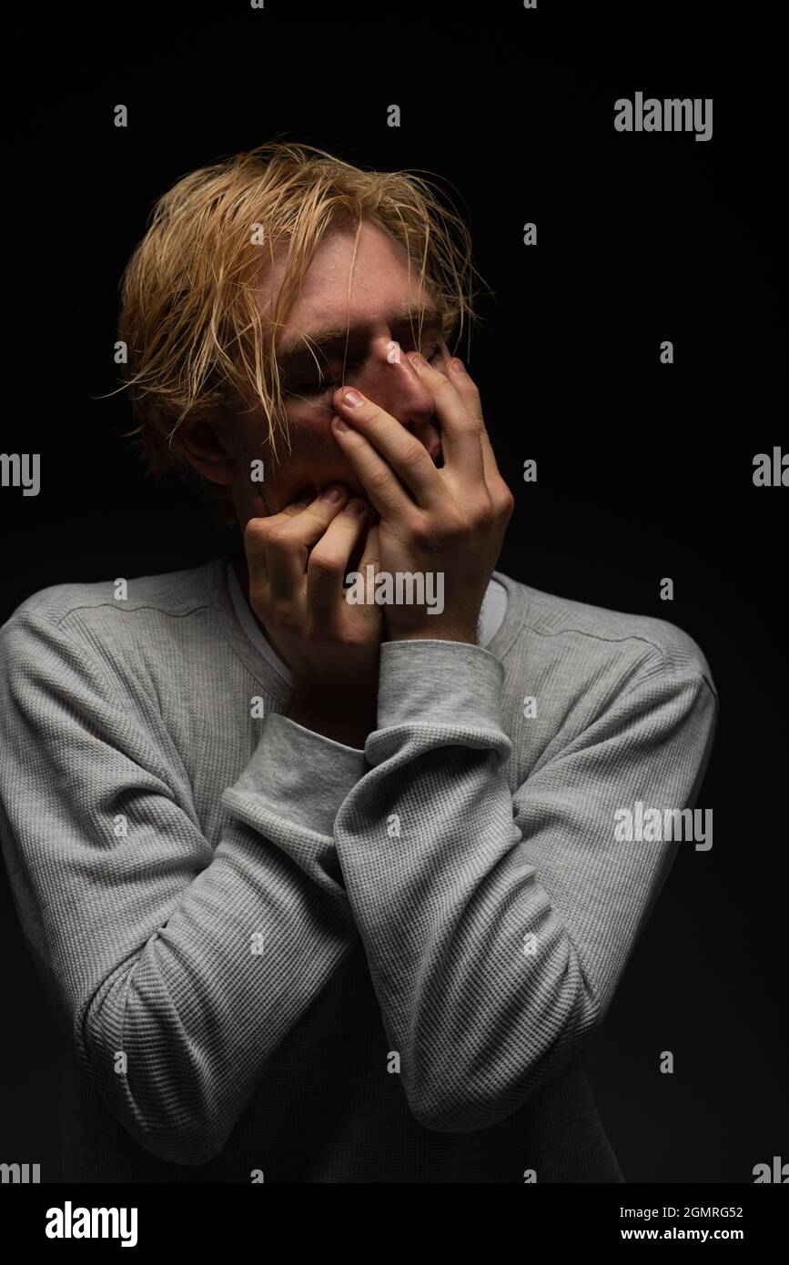 Perfect portrait of very sad boy crying while hurting himself Stock ...