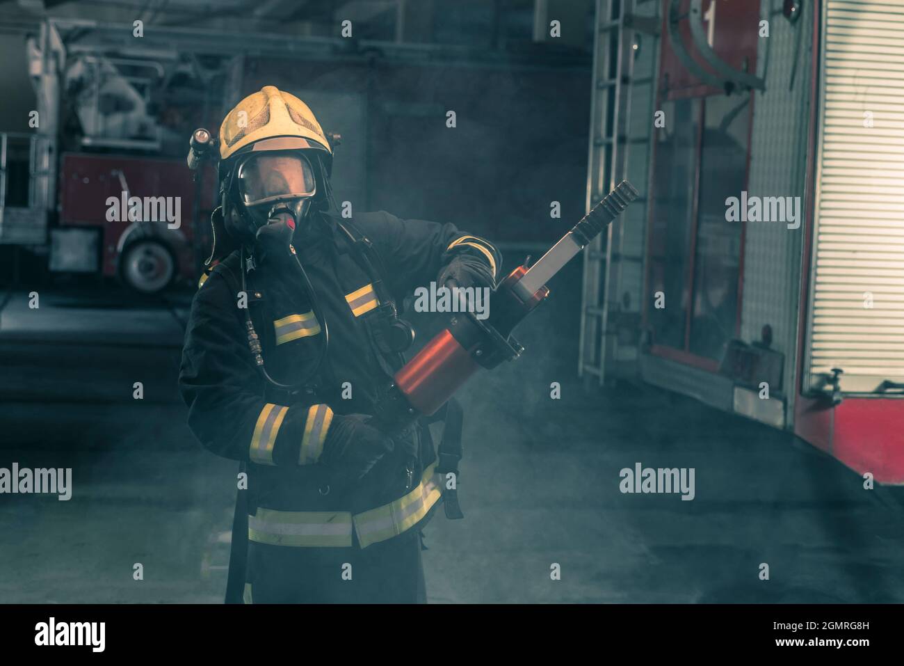 Portrait of a brave firefighter standing confident wearing full ...