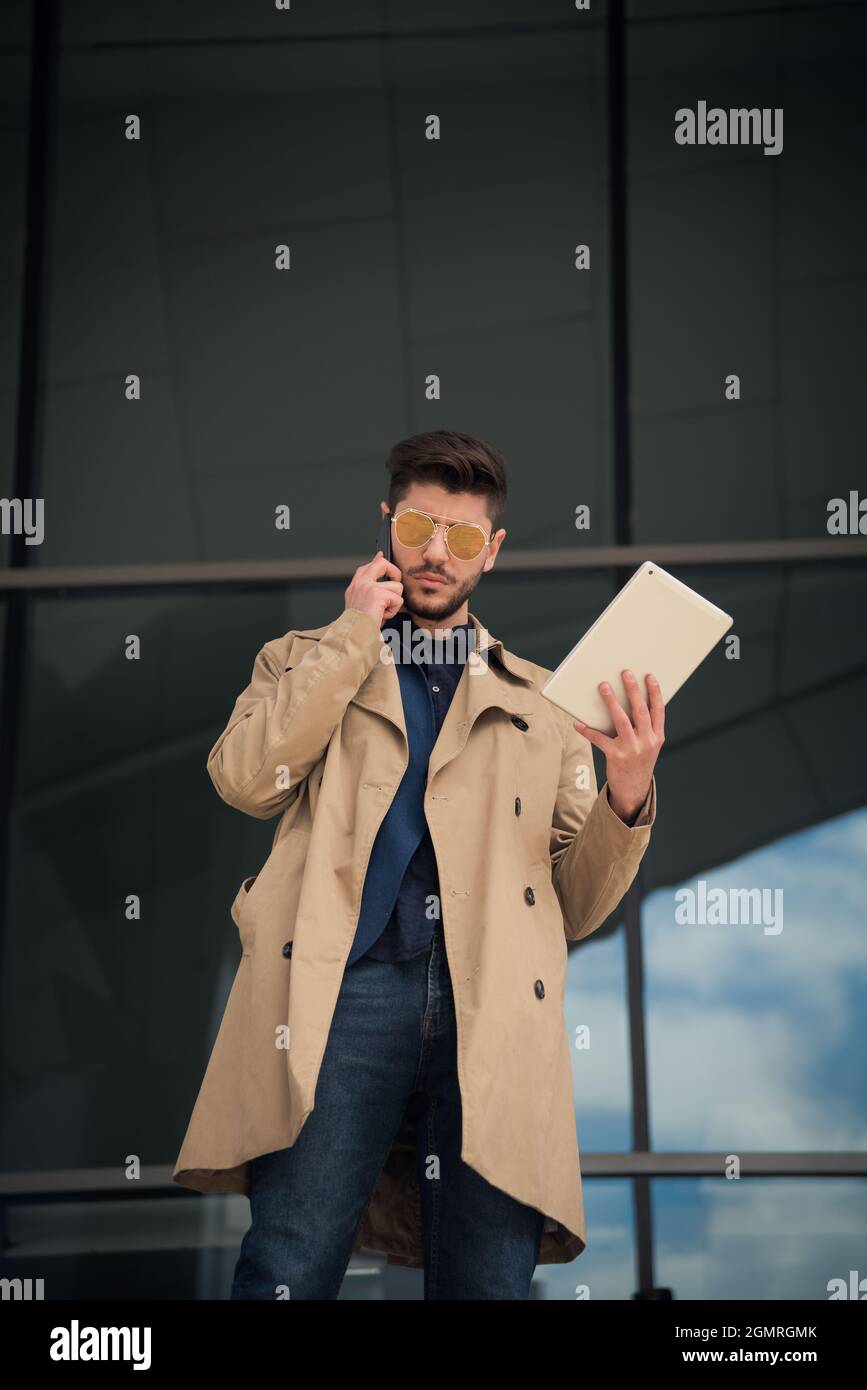 Handsome businessman is having a conversation about the offer Stock ...