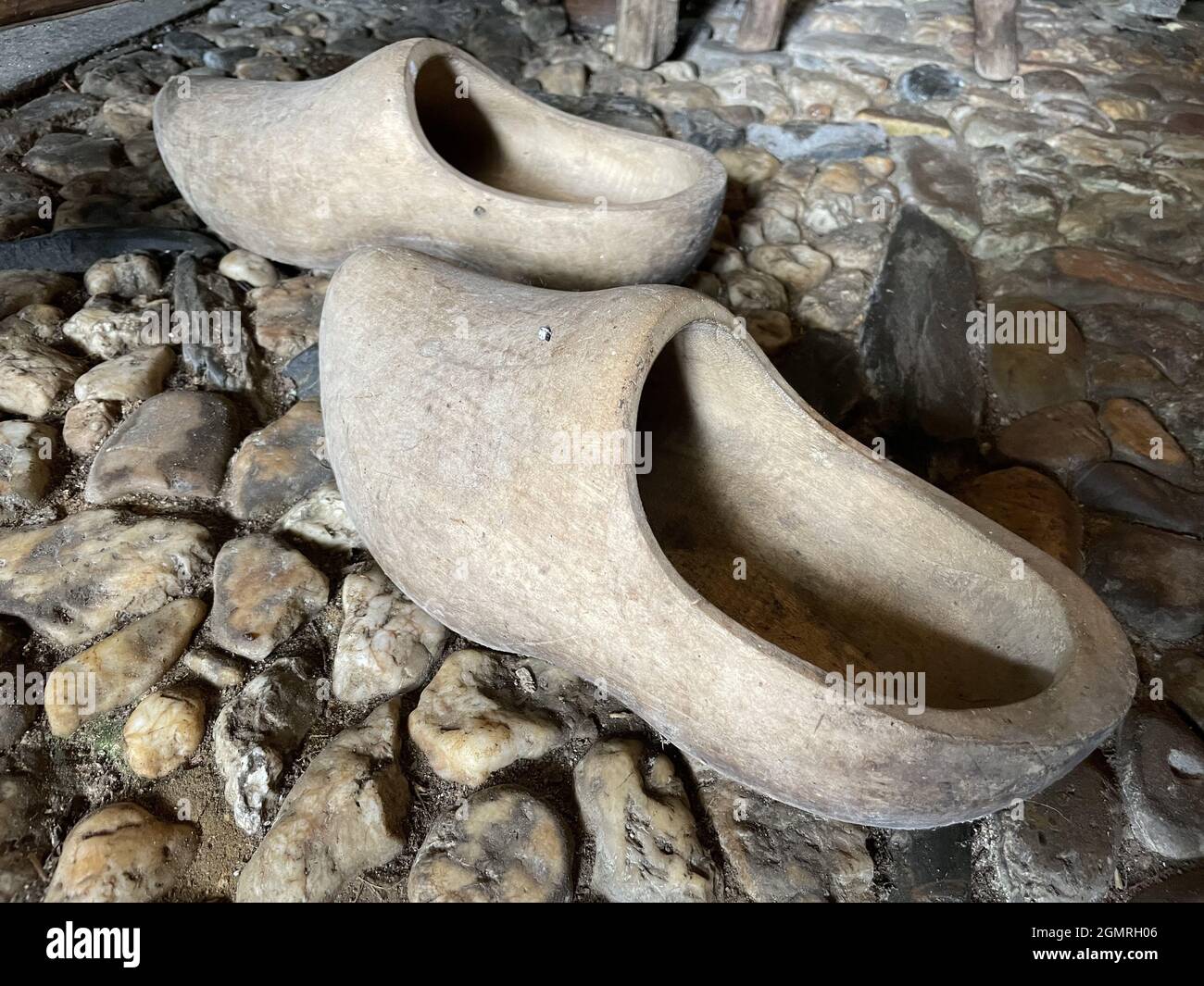 Closeup shot of wooden clogs on the stones Stock Photo - Alamy