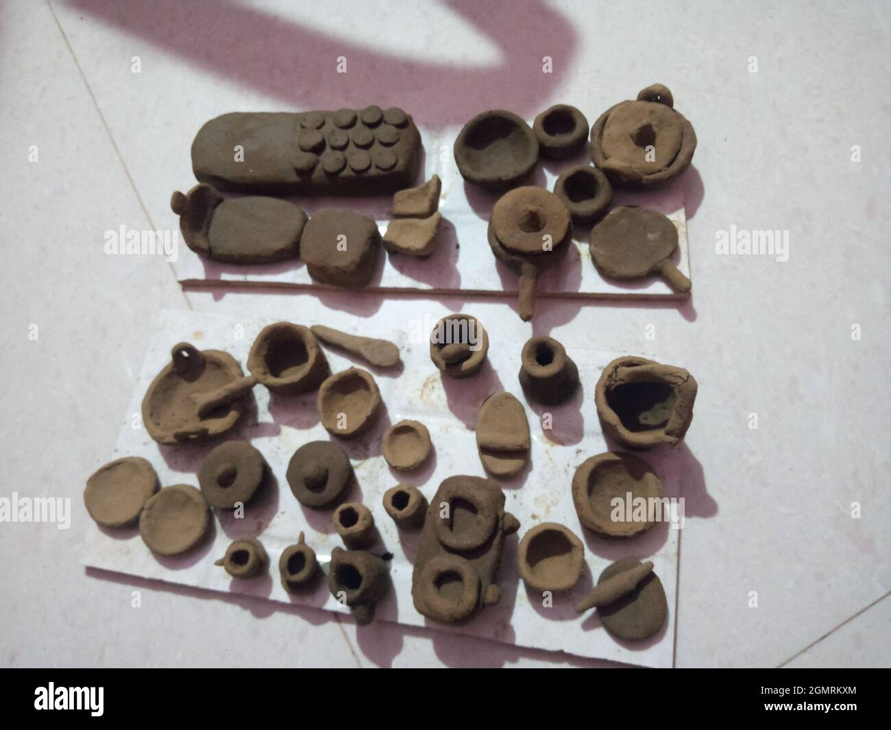 Top view of old artifacts from ancient years on a white surface Stock ...