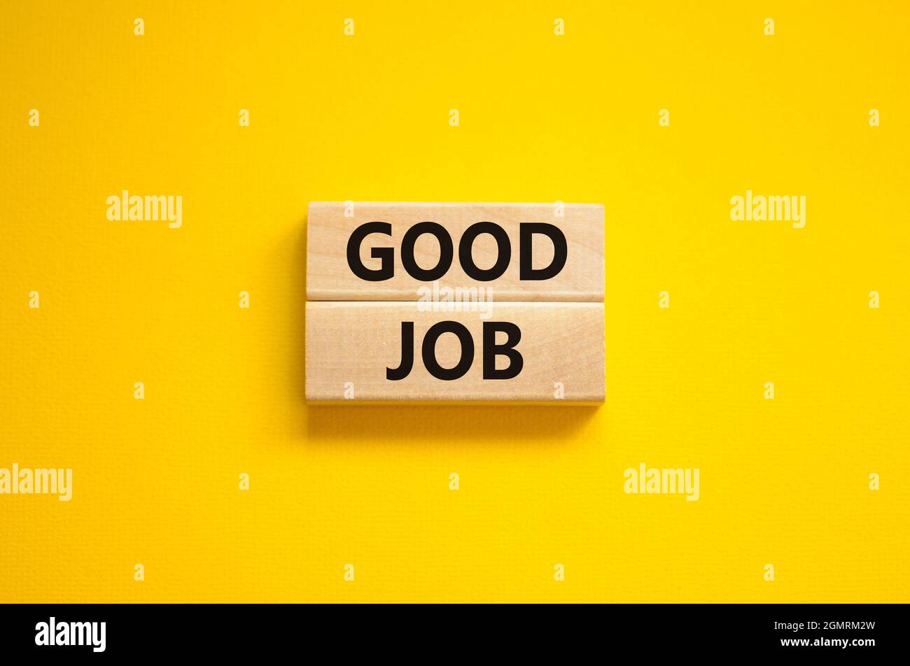 Good job symbol. Concept words 'good job' on wooden blocks on a ...