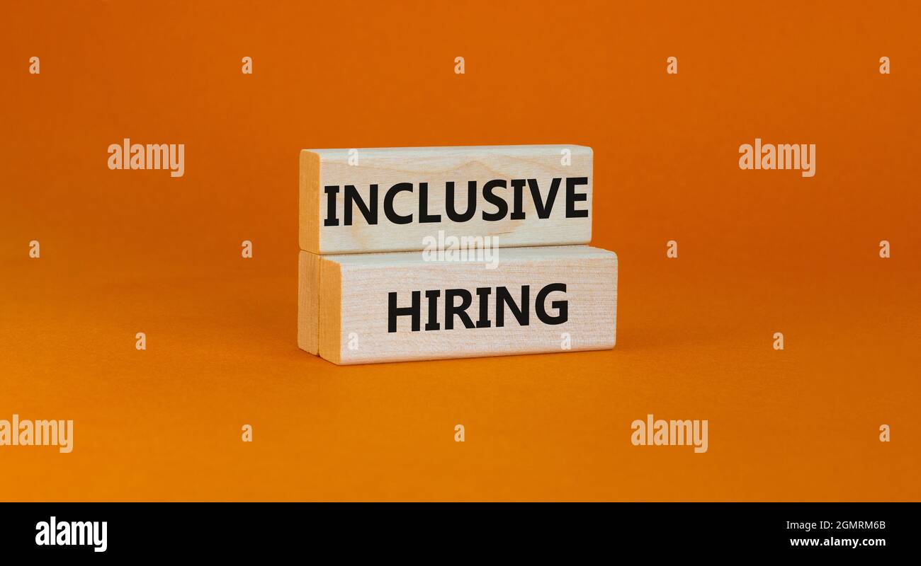 Inclusive hiring symbol. Wooden blocks with words Inclusive hiring on ...