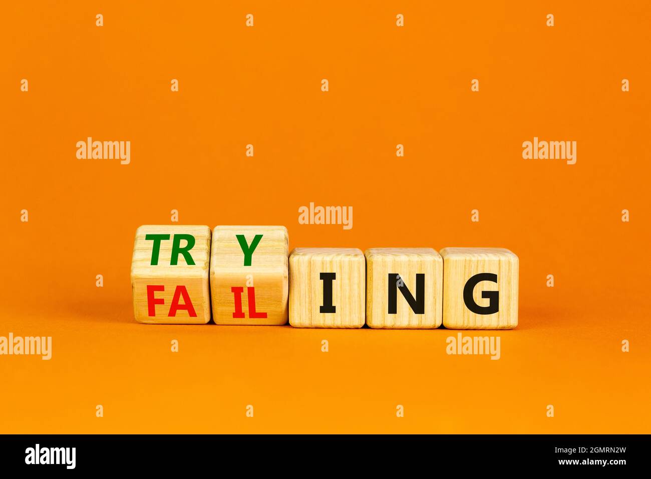 Failing or trying symbol. Turned wooden cubes and changed the word ...