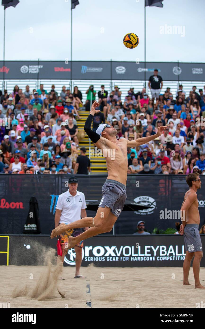Olympian Jake Gibb (USA) serves the ball during the finals at the AVP ...