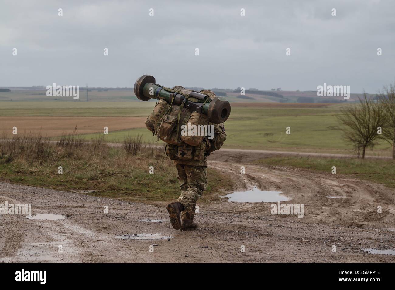 British army soldier completing an 8 mile combat fitness test tabbing ...