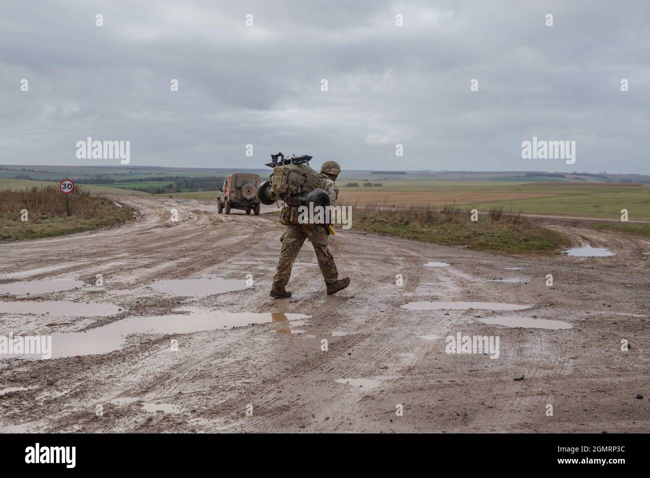 British army soldier completing an 8 mile combat fitness test tabbing ...
