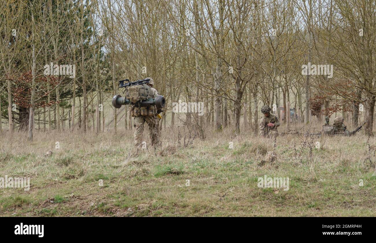 British army soldier completing an 8 mile combat fitness test tabbing ...