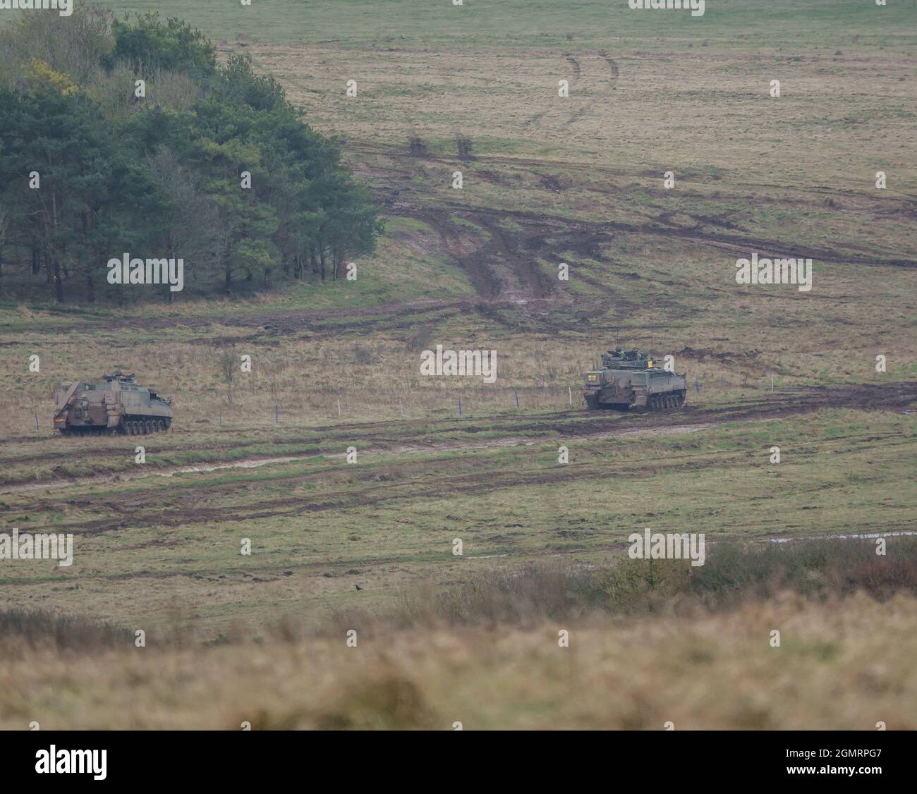 British army Warrior FV512 MRV & Warrior FV510 IFV tanks in action on a ...