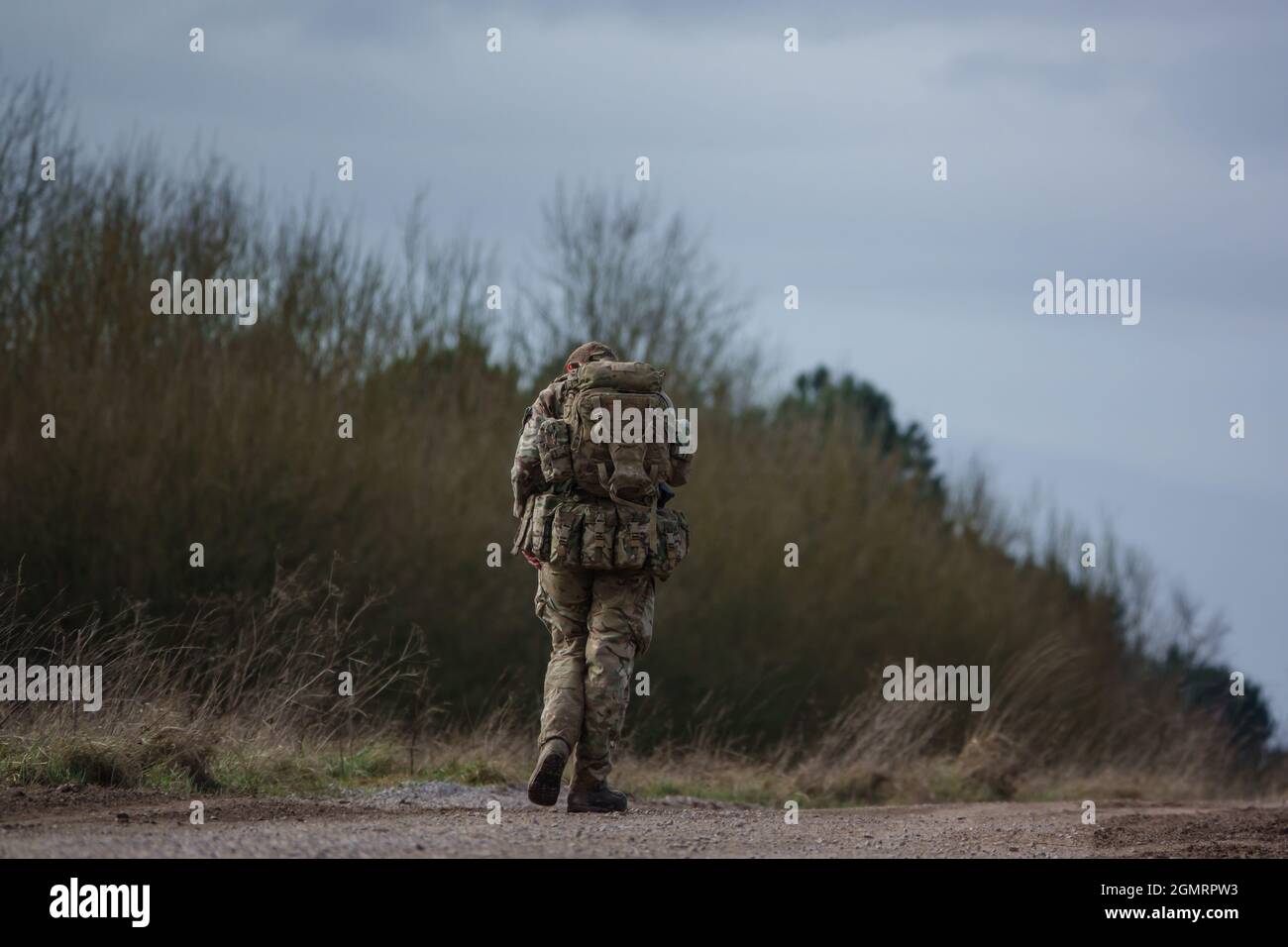 British army soldier completing an 8 mile combat training test tabbing ...