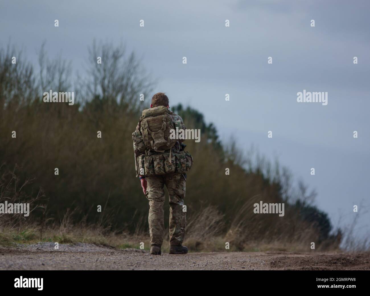 British army soldier completing an 8 mile combat training test tabbing ...