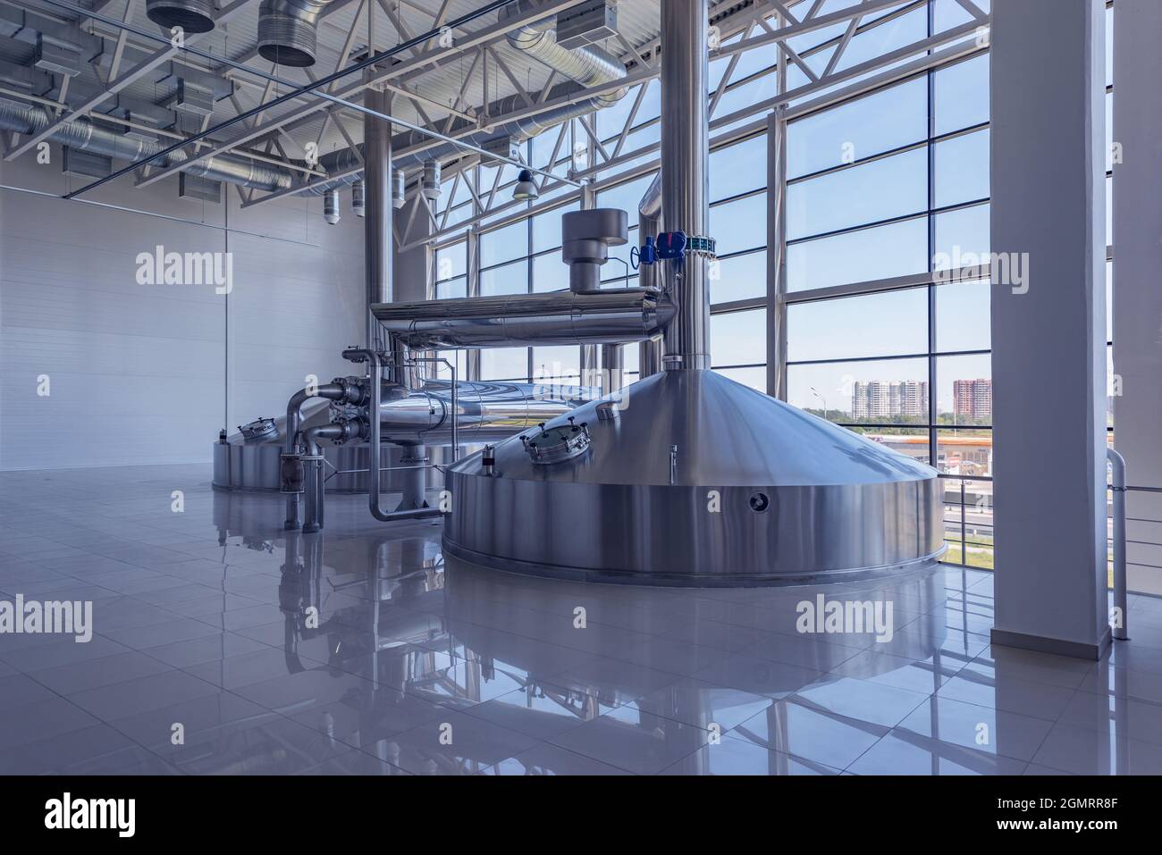 Equipment for brewing beer inside of the plant Stock Photo - Alamy