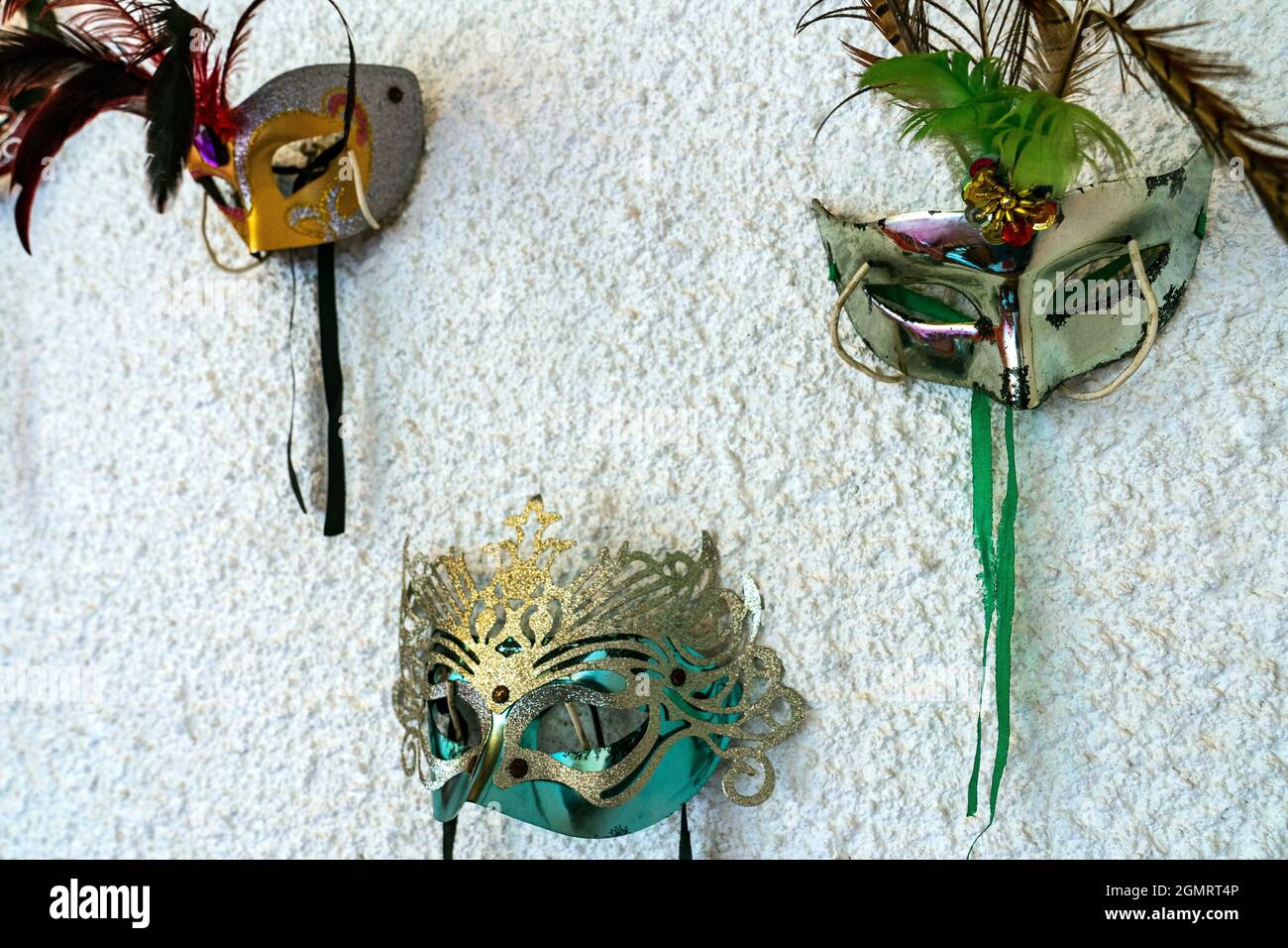 Carnival masks on the wall Stock Photo - Alamy