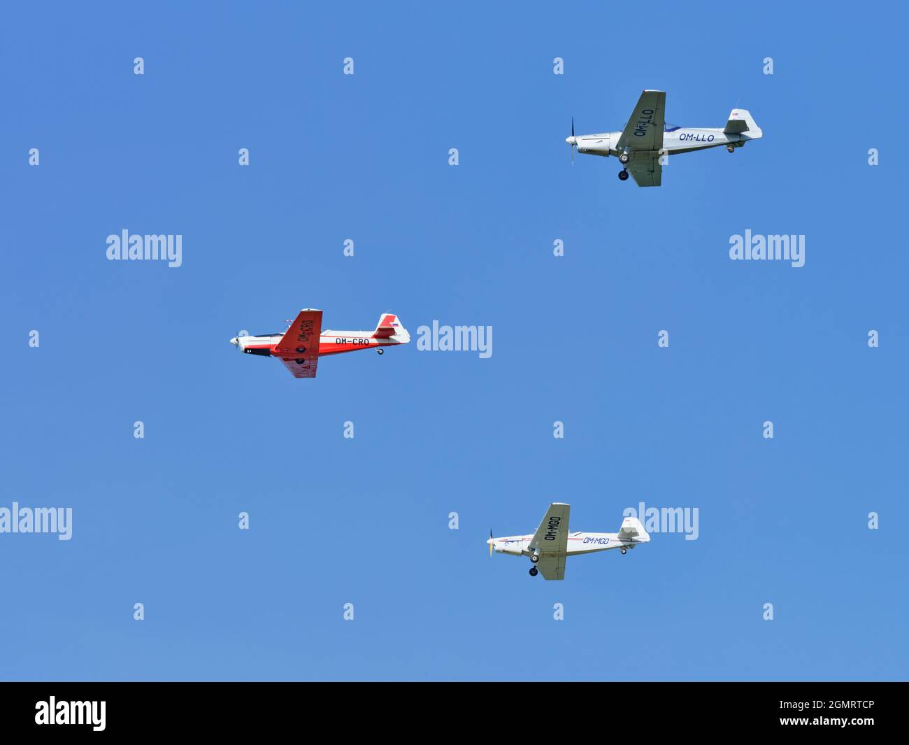 Light aerobatic aircrafts in close flight Stock Photo - Alamy