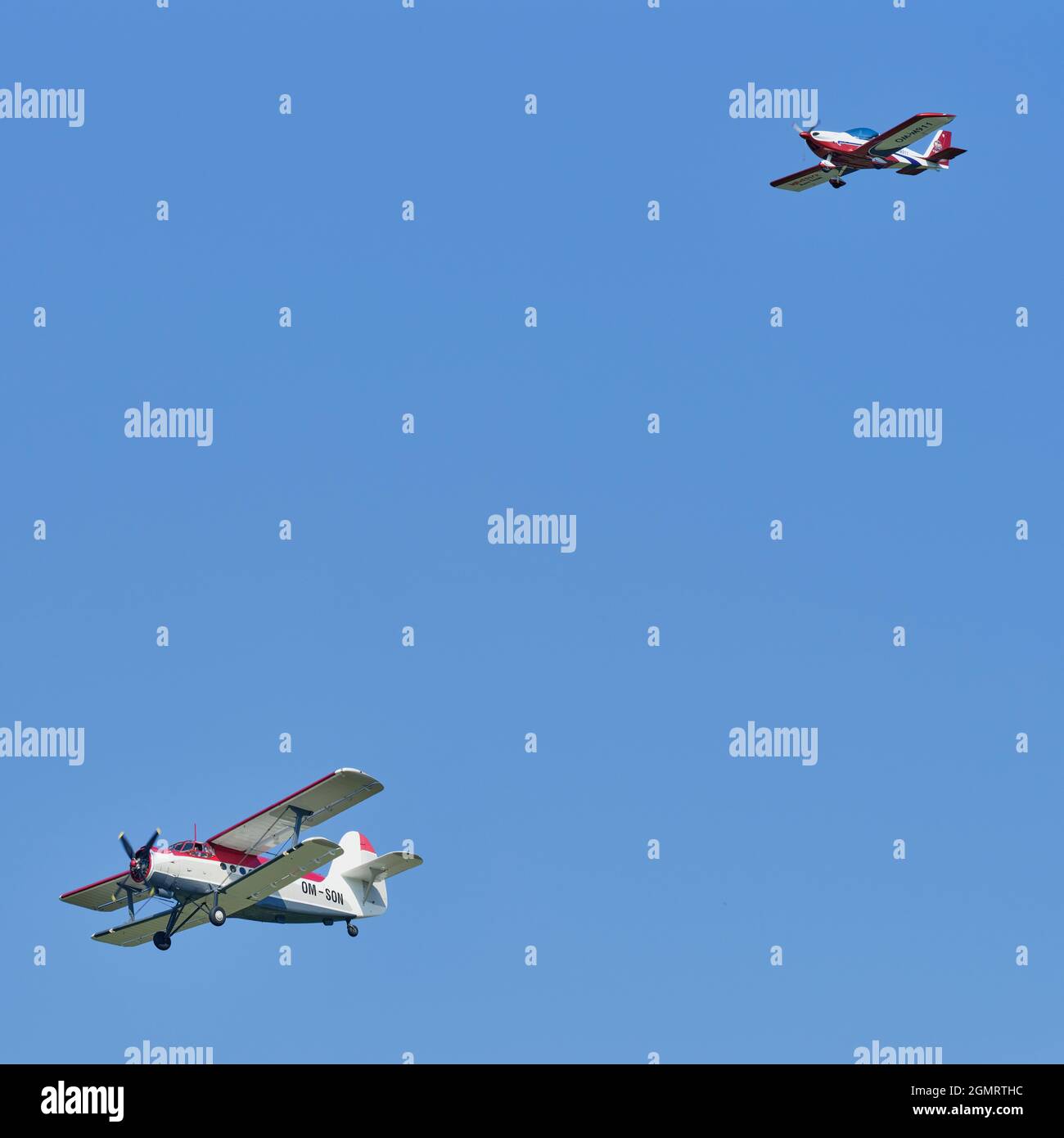 Light aerobatic aircrafts in close flight Stock Photo - Alamy