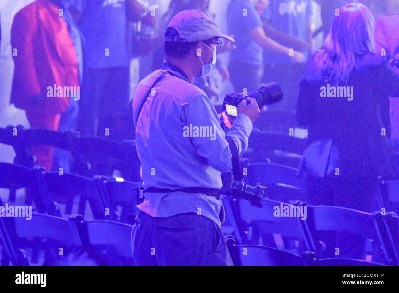 Photographer Ringo H.W. Chiu takes photos during a groundbreaking ...