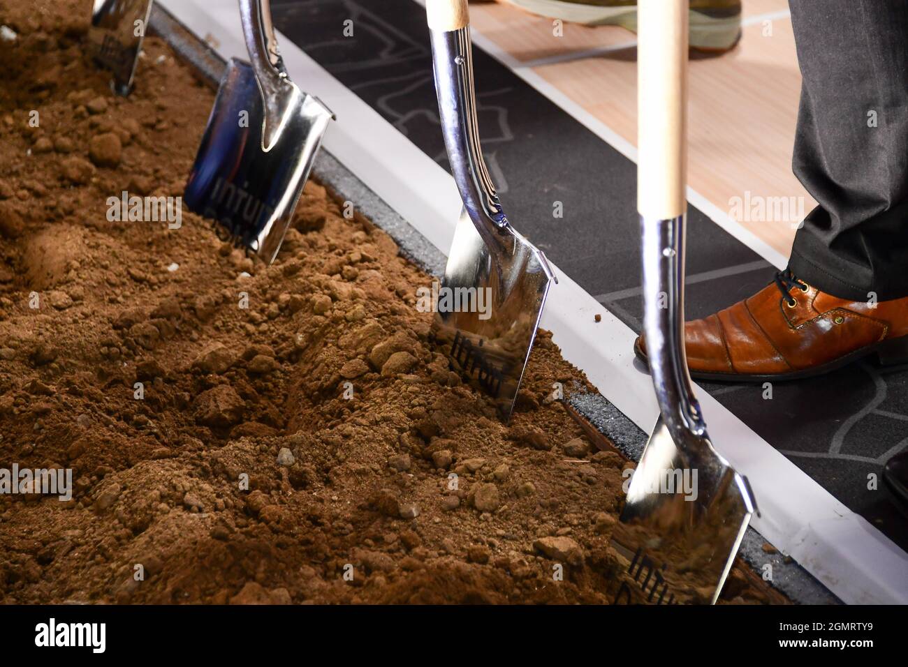 Groundbreaking ceremony shovels hi-res stock photography and images - Alamy