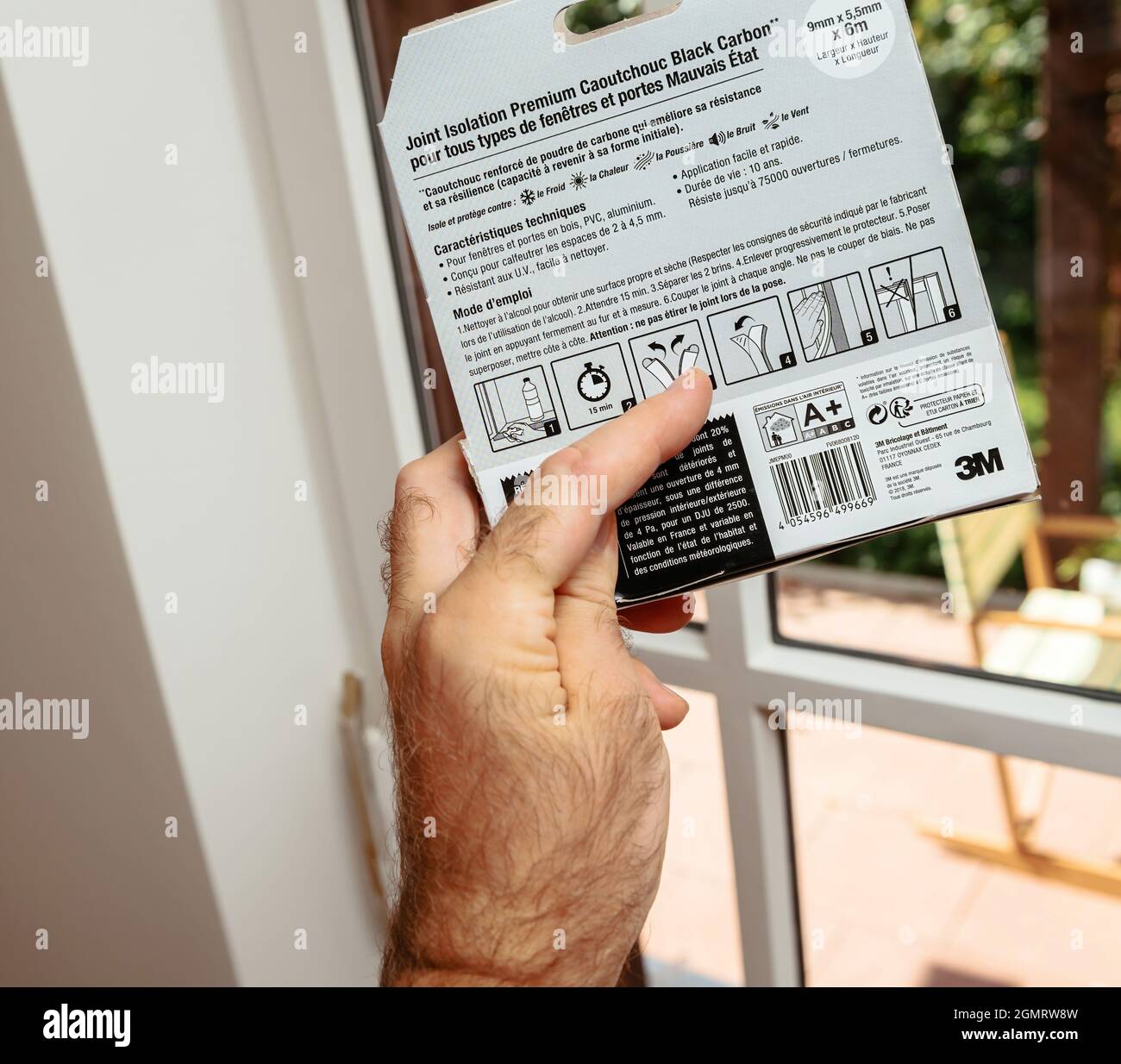 OV male hand holding near the window of new package with 3M Premium ...