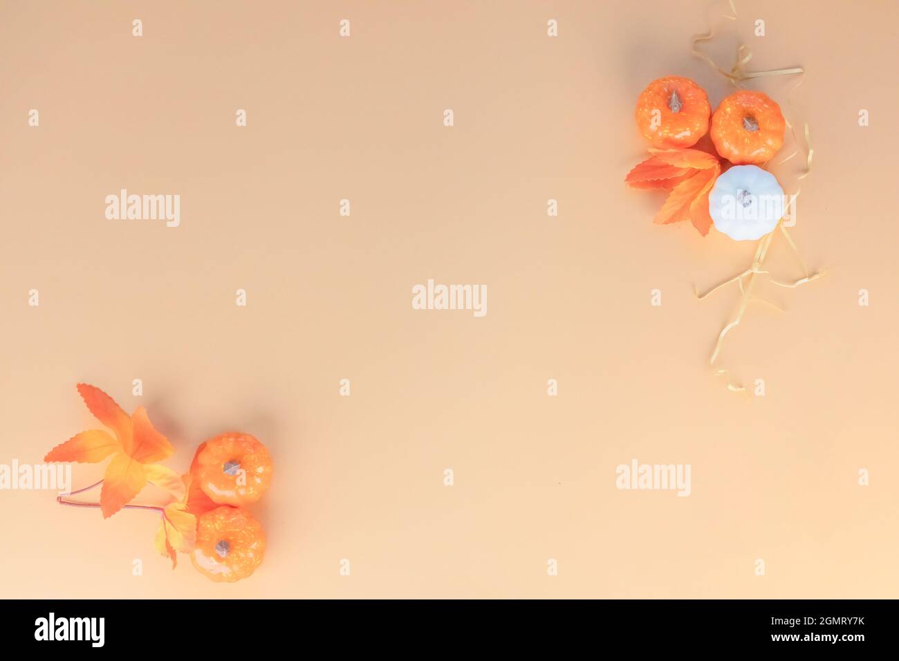 Light orange background of autumn with fall leaves and pumpkins Stock ...