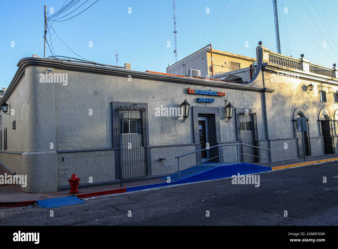 Facade of the gray building of the El Imparcial newspaper and the ...