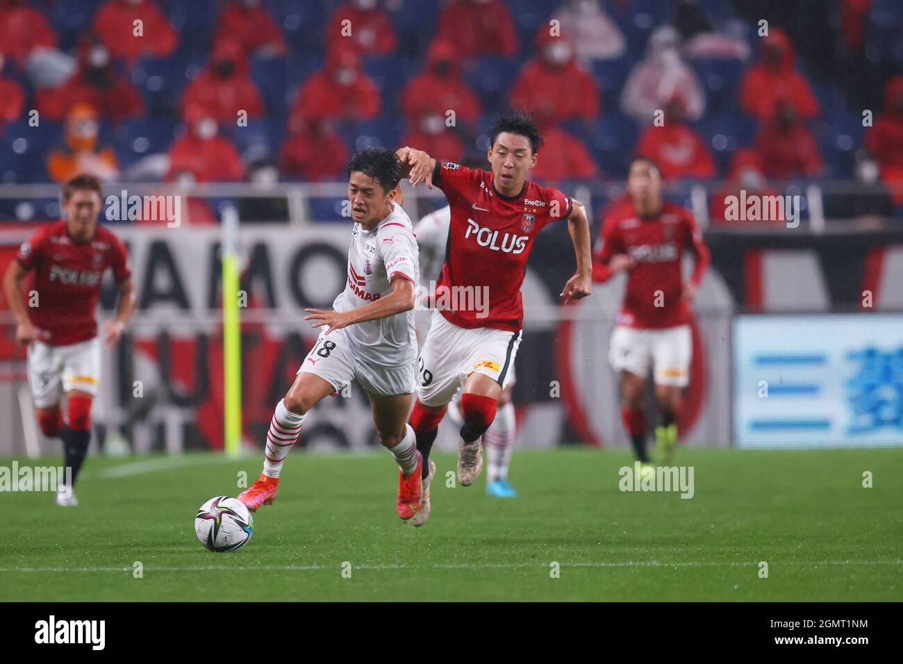 Saitama, Japan. 18th Sep, 2021. (L to R) Jun Nishikawa (Cerezo), Kai ...