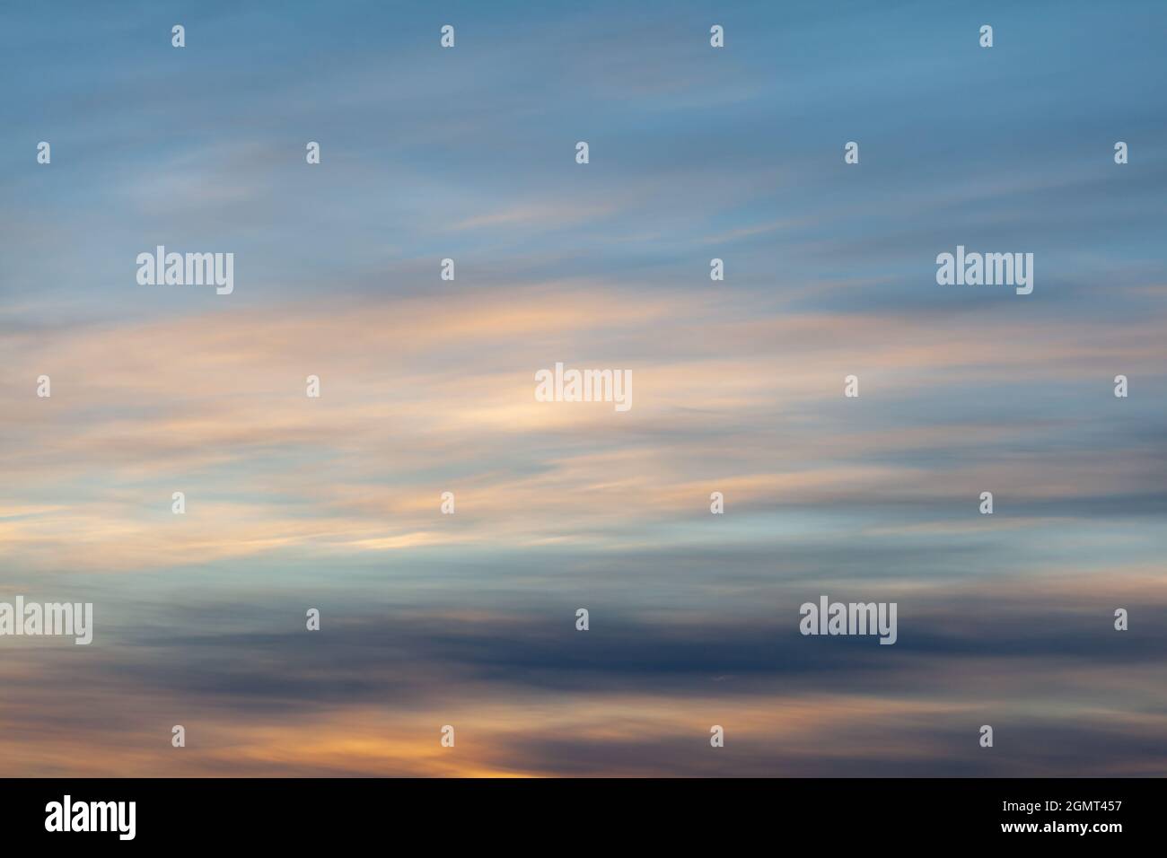 Colorful sunset or sunrise in the sky. The sky and clouds are painted ...