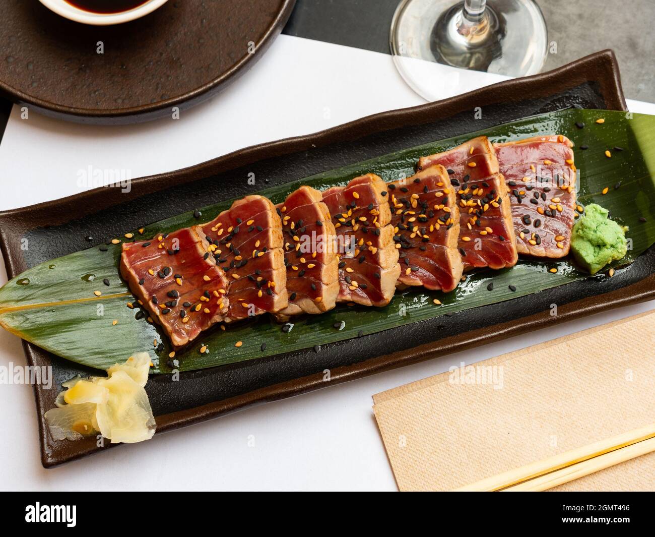 Popular Japanese dish Tataki from tuna with an appetizing ponzu sauce ...
