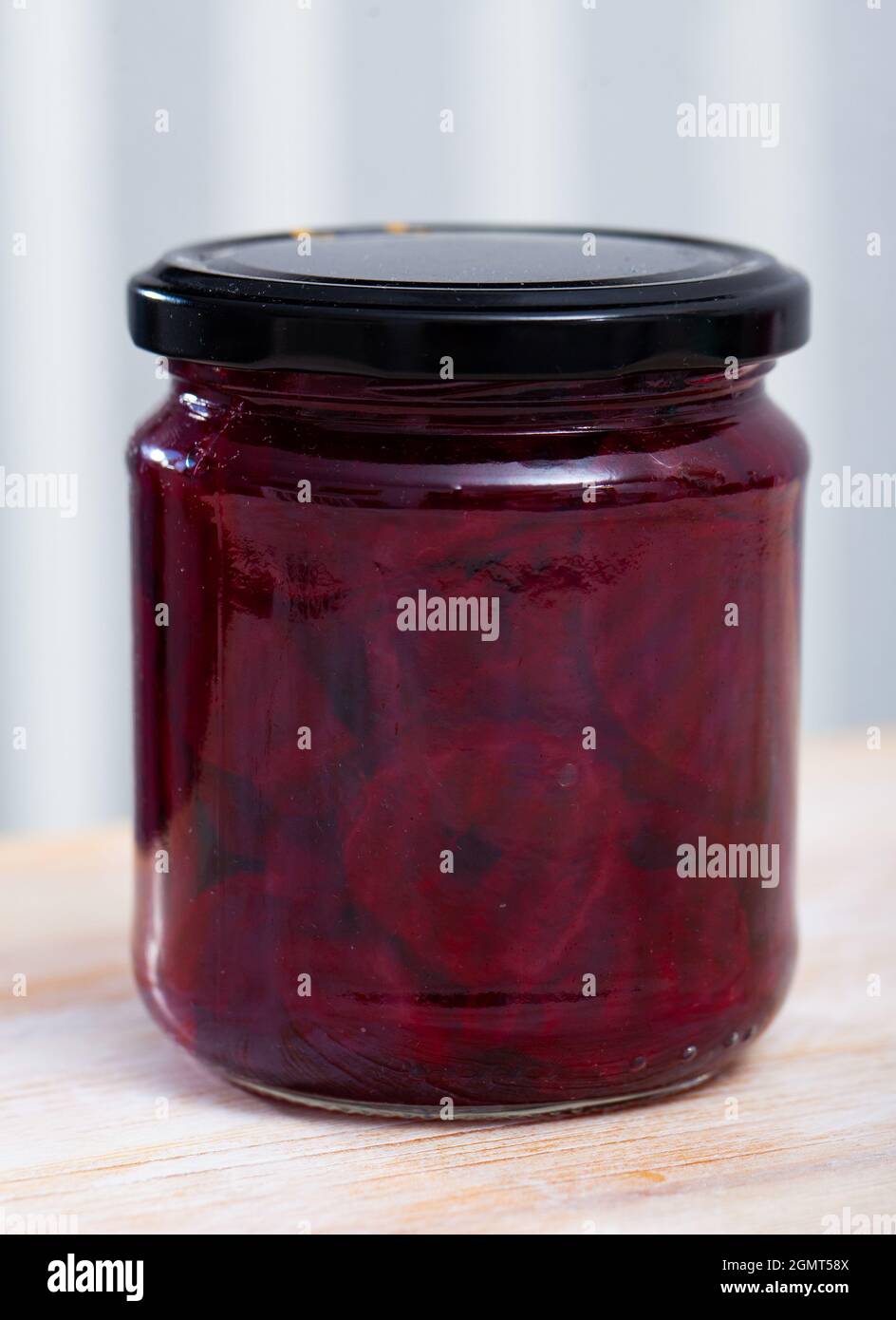 Glass jar with pickled red beets Stock Photo - Alamy
