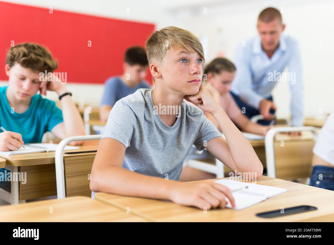 Portrait of attentive focused boy in auditorium Stock Photo - Alamy